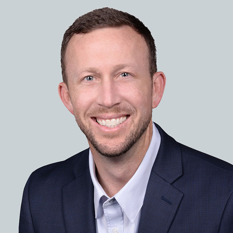 Justin Kuehn | CBRE